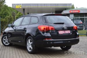Black Opel Astra 2016 in Tukums, with an engine capacity of 1.40 L and mileage of 199 thousand km for 5595 €, photo 5 on AUTOMOTO.COM.LV