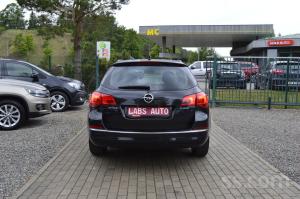 Black Opel Astra 2016 in Tukums, with an engine capacity of 1.40 L and mileage of 199 thousand km for 5595 €, photo 6 on AUTOMOTO.COM.LV