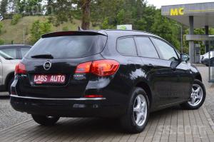Black Opel Astra 2016 in Tukums, with an engine capacity of 1.40 L and mileage of 199 thousand km for 5595 €, photo 7 on AUTOMOTO.COM.LV