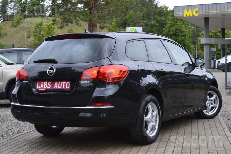 Black Opel Astra 2016 in Tukums, with an engine capacity of 1.40 L and mileage of 199 thousand km for 5595 €, photo 7 on AUTOMOTO.COM.LV