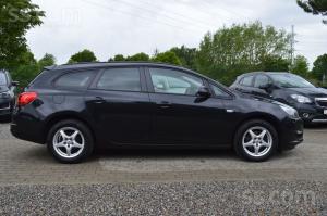 Black Opel Astra 2016 in Tukums, with an engine capacity of 1.40 L and mileage of 199 thousand km for 5595 €, photo 8 on AUTOMOTO.COM.LV