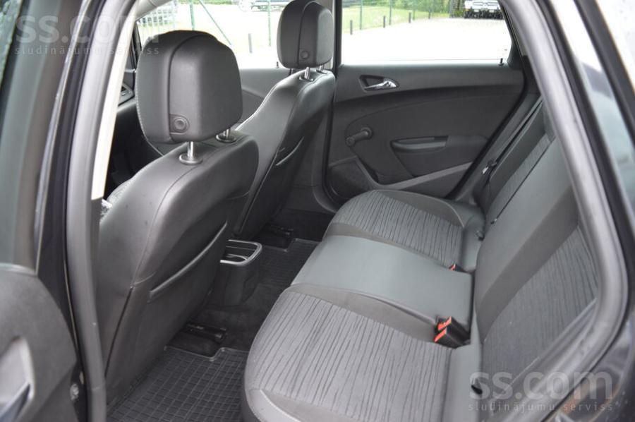 Black Opel Astra 2016 in Tukums, with an engine capacity of 1.40 L and mileage of 199 thousand km for 5595 €, photo 10 on AUTOMOTO.COM.LV