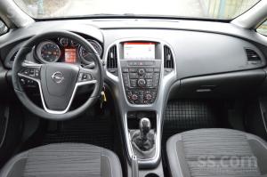 Black Opel Astra 2016 in Tukums, with an engine capacity of 1.40 L and mileage of 199 thousand km for 5595 €, photo 13 on AUTOMOTO.COM.LV