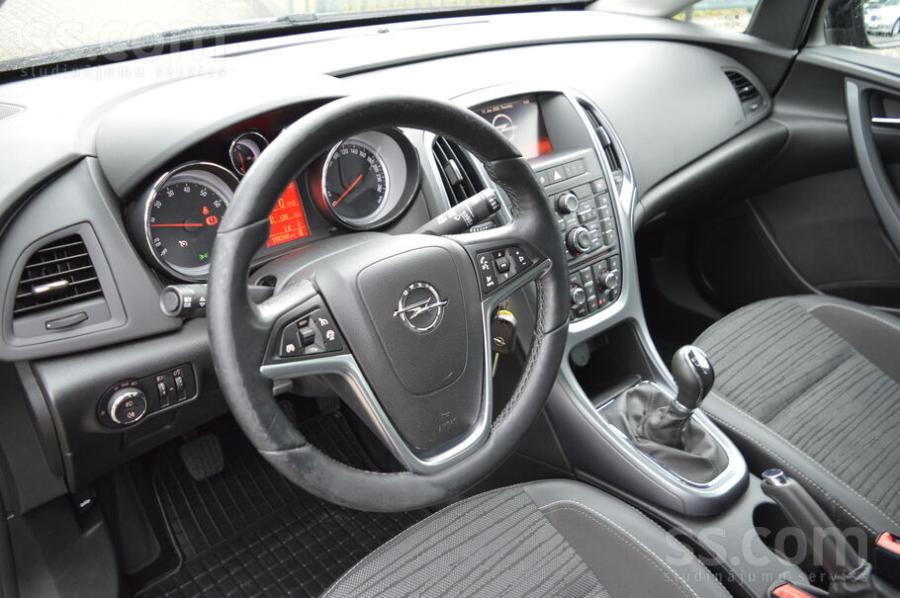 Black Opel Astra 2016 in Tukums, with an engine capacity of 1.40 L and mileage of 199 thousand km for 5595 €, photo 14 on AUTOMOTO.COM.LV