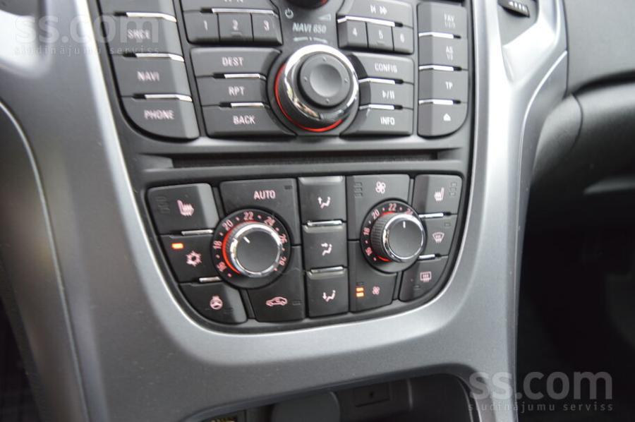 Black Opel Astra 2016 in Tukums, with an engine capacity of 1.40 L and mileage of 199 thousand km for 5595 €, photo 15 on AUTOMOTO.COM.LV