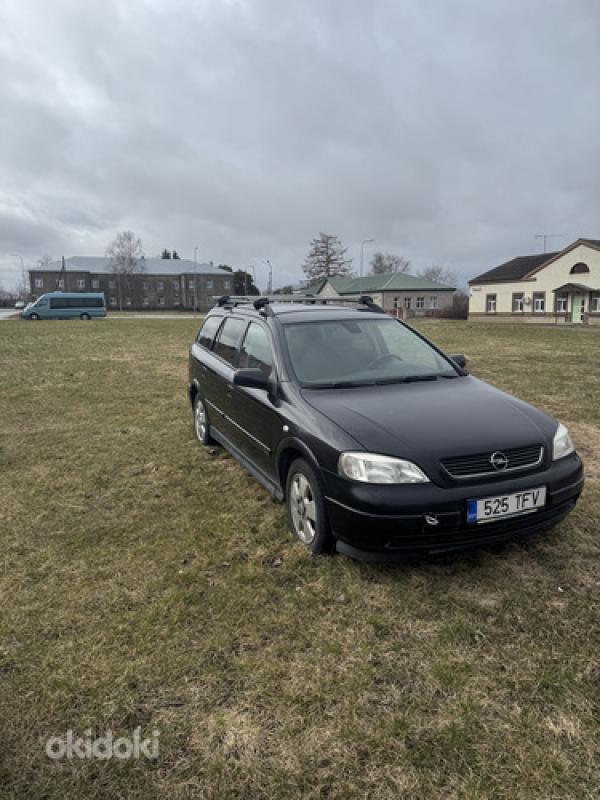 Black Opel Astra 2003 in Kunda, with an engine capacity of 2.00 L and mileage of 325 thousand km for 500 €, photo 5 on AUTOMOTO.COM.LV