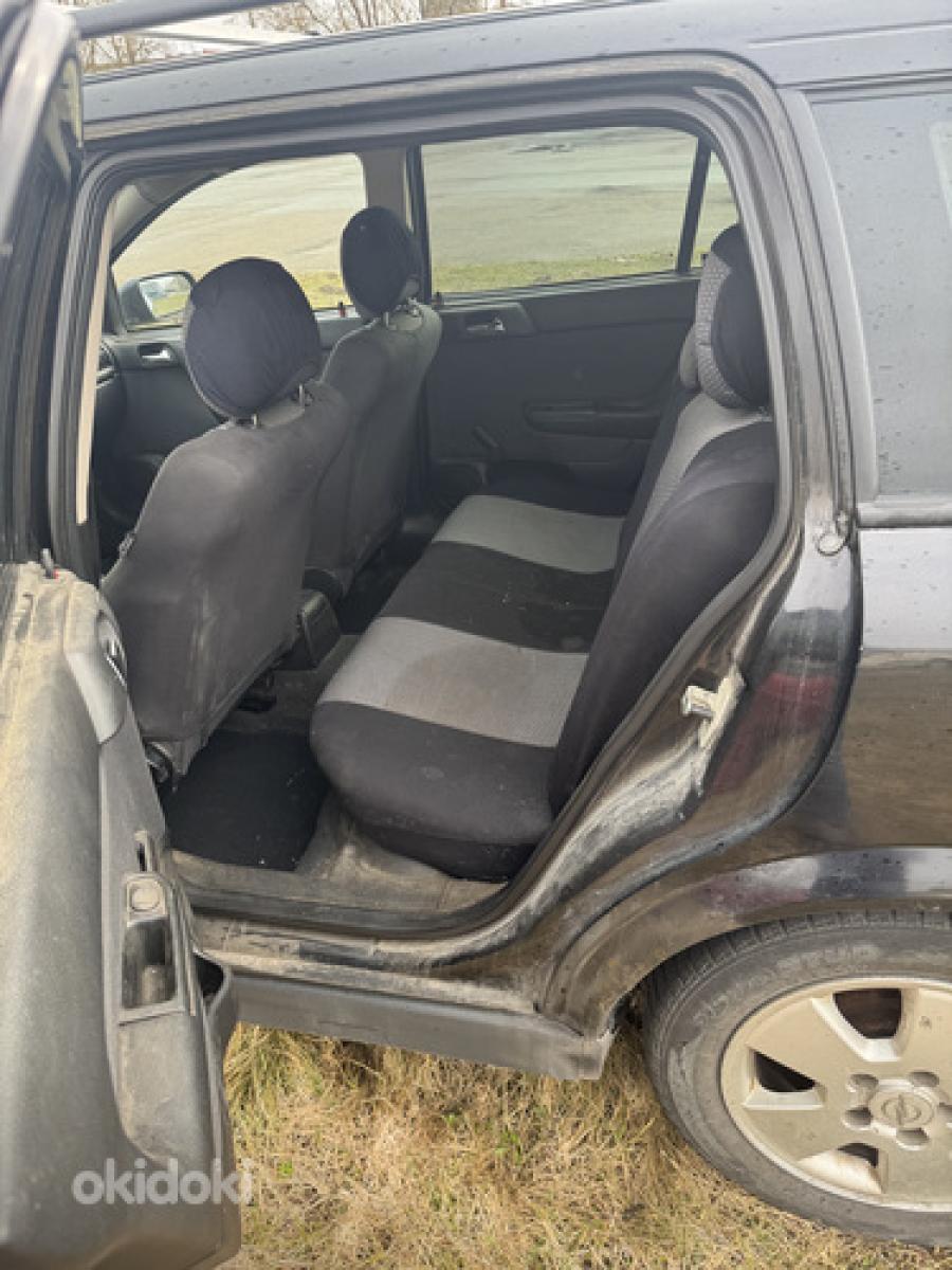 Melns Opel Astra 2003 Kunda, ar dzinēja tilpumu 2.00 L un nobraukumu 325 tūkst. km par 500 €, foto 9 vietnē AUTOMOTO.COM.LV