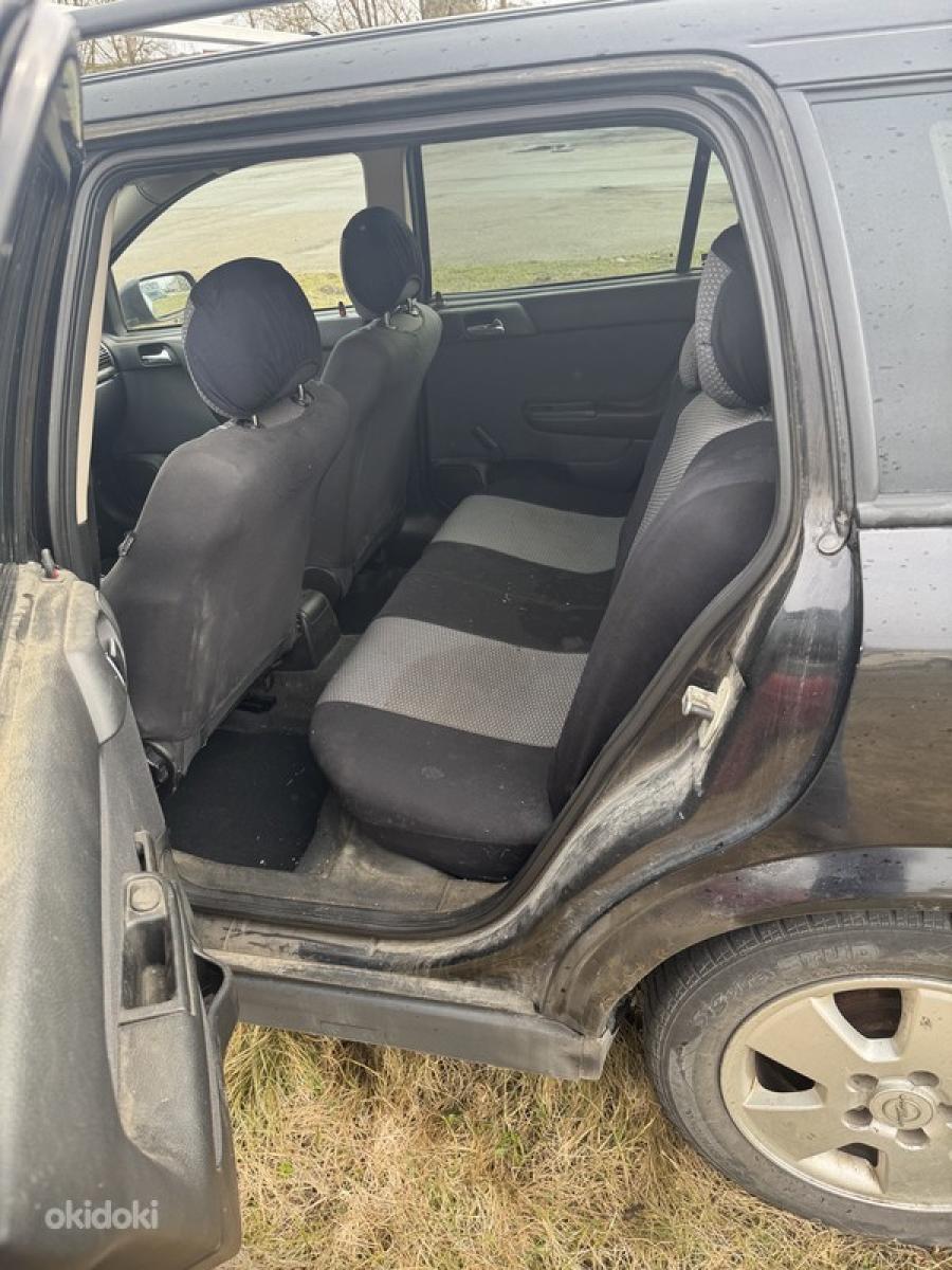 Melns Opel Astra 2003 Kunda, ar dzinēja tilpumu 2.00 L un nobraukumu 325 tūkst. km par 500 €, foto 23 vietnē AUTOMOTO.COM.LV