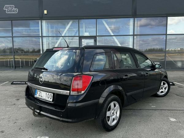 Black Opel Astra 2005 in Panevezys, with an engine capacity of 1.70 L and mileage of 343 thousand km for 840 €, photo 8 on AUTOMOTO.COM.LV
