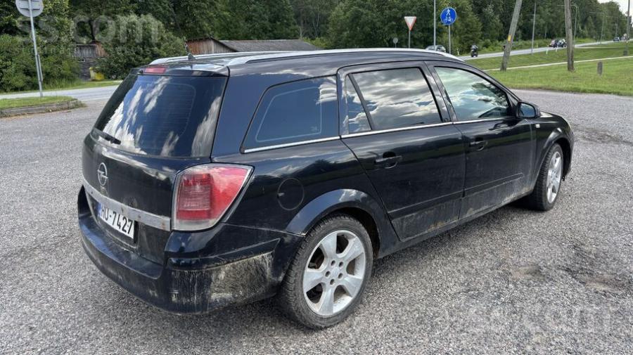 Black Opel Astra 2005 in Ogre, with an engine capacity of 1.90 L and mileage of 382 thousand km for 550 €, photo 4 on AUTOMOTO.COM.LV