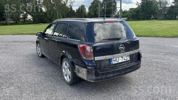Black Opel Astra 2005 in Ogre, with an engine capacity of 1.90 L and mileage of 382 thousand km for 550 €, photo 4 on AUTOMOTO.COM.LV