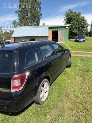 Melns Opel Astra 2006 Cēsis, ar dzinēja tilpumu 1.90 L un nobraukumu 360 tūkst. km par 1700 €, foto 4 vietnē AUTOMOTO.COM.LV