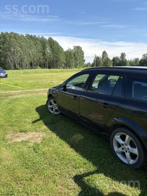 Melns Opel Astra 2006 Cēsis, ar dzinēja tilpumu 1.90 L un nobraukumu 360 tūkst. km par 1700 €, foto 5 vietnē AUTOMOTO.COM.LV