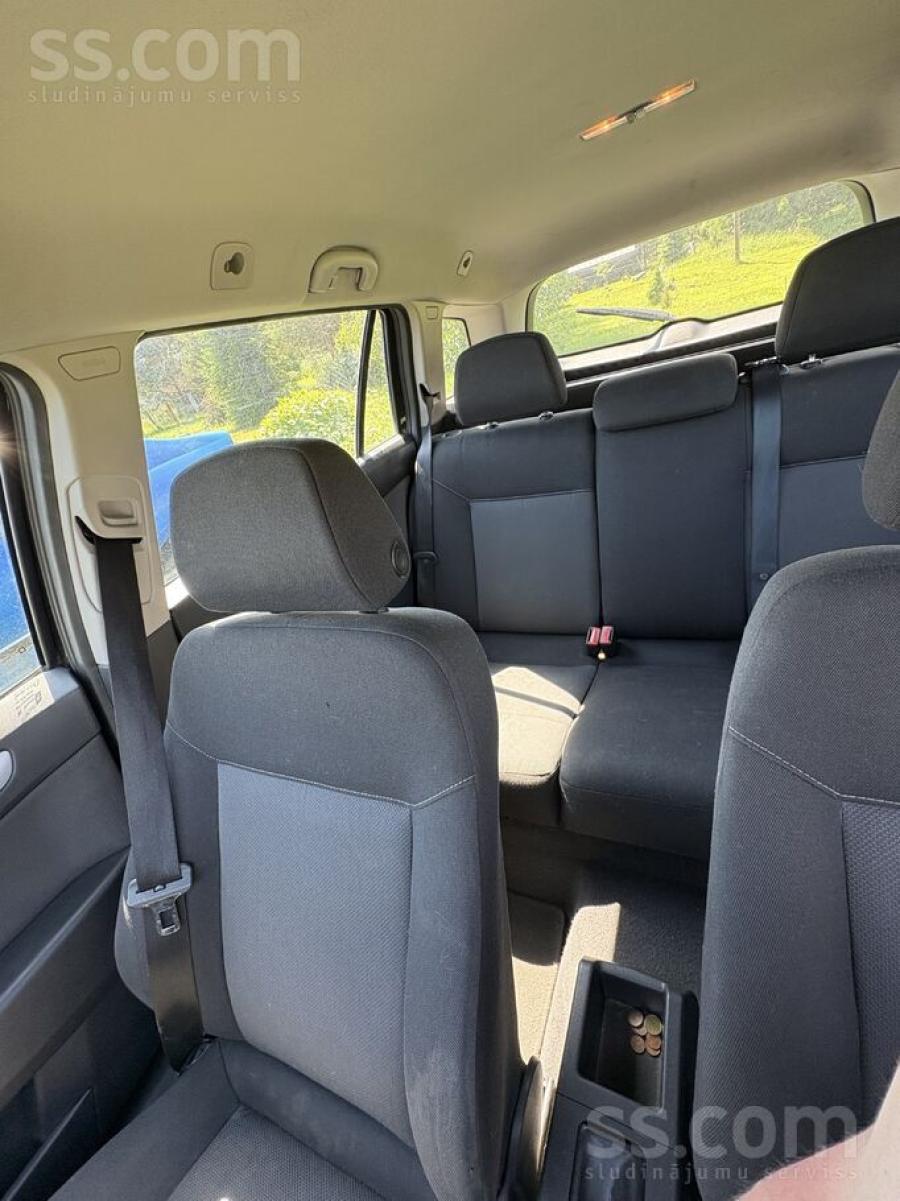 Melns Opel Astra 2006 Cēsis, ar dzinēja tilpumu 1.90 L un nobraukumu 360 tūkst. km par 1700 €, foto 7 vietnē AUTOMOTO.COM.LV