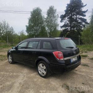 Black Opel Astra 2007 in Riga, with an engine capacity of 1.70 L and mileage of 370 thousand km for 1390 €, photo 6 on AUTOMOTO.COM.LV