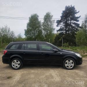 Black Opel Astra 2007 in Riga, with an engine capacity of 1.70 L and mileage of 370 thousand km for 1390 €, photo 7 on AUTOMOTO.COM.LV