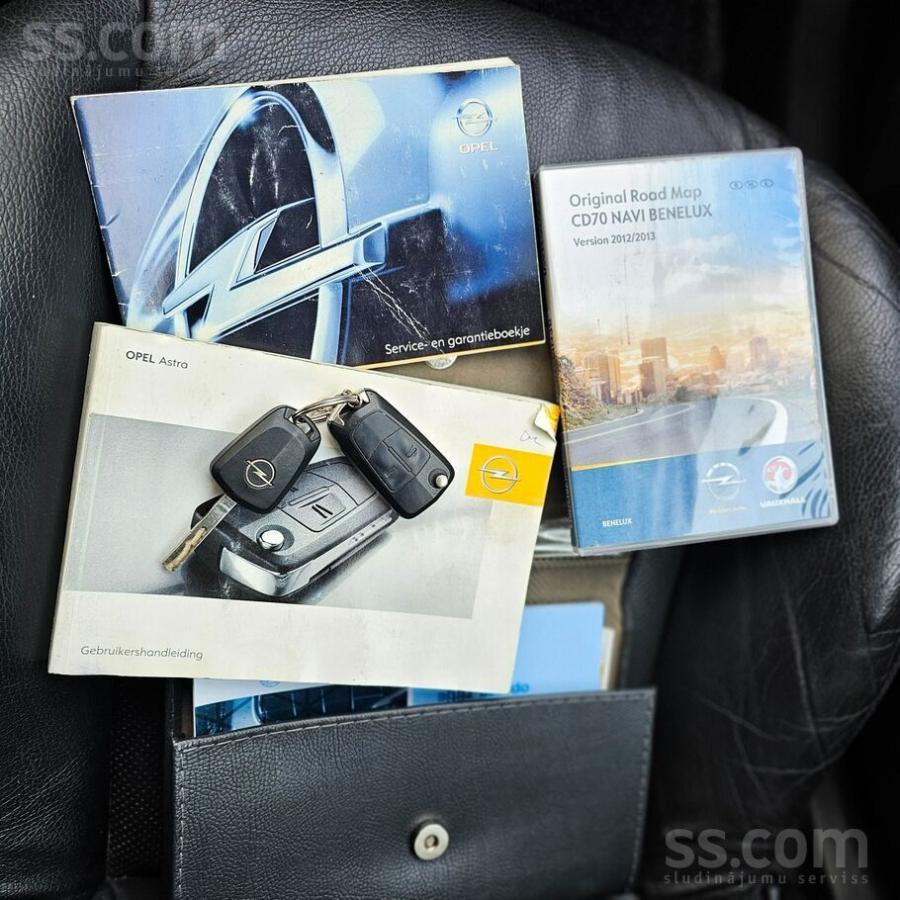 Black Opel Astra 2007 in Riga, with an engine capacity of 1.70 L and mileage of 370 thousand km for 1390 €, photo 14 on AUTOMOTO.COM.LV