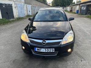 Black Opel Astra 2007 in Valmiera, with an engine capacity of 1.90 L and mileage of 235 thousand km for 1600 €, photo 8 on AUTOMOTO.COM.LV