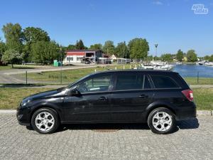 Black Opel Astra 2008 in Klaipeda, with an engine capacity of 1.70 L and mileage of 289 thousand km for 1450 €, photo 7 on AUTOMOTO.COM.LV