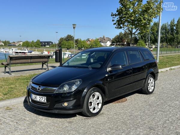 Black Opel Astra 2008 in Klaipeda, with an engine capacity of 1.70 L and mileage of 289 thousand km for 1450 €, photo 7 on AUTOMOTO.COM.LV