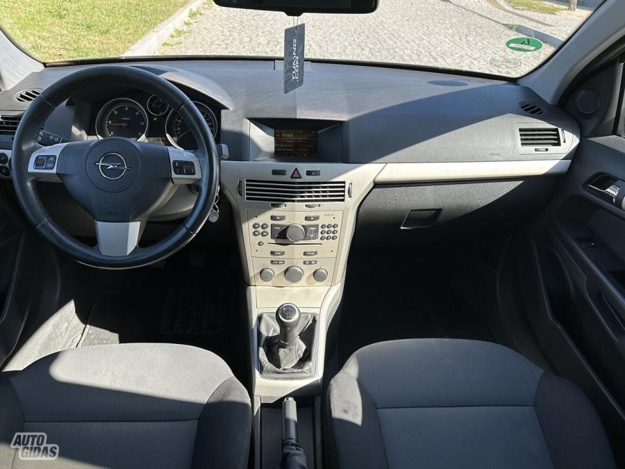 Black Opel Astra 2008 in Klaipeda, with an engine capacity of 1.70 L and mileage of 289 thousand km for 1450 €, photo 11 on AUTOMOTO.COM.LV