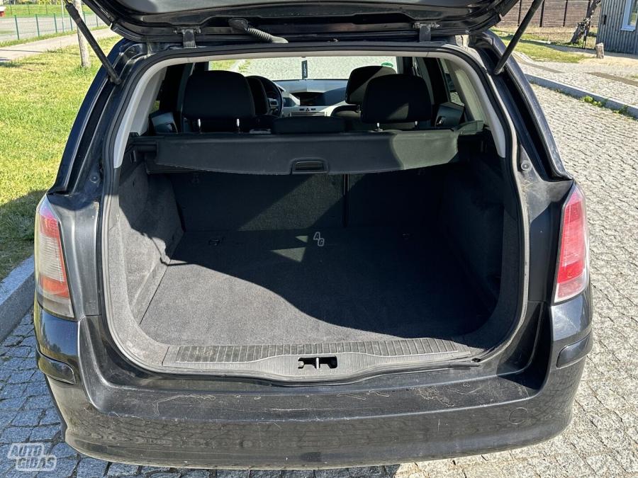 Black Opel Astra 2008 in Klaipeda, with an engine capacity of 1.70 L and mileage of 289 thousand km for 1450 €, photo 15 on AUTOMOTO.COM.LV