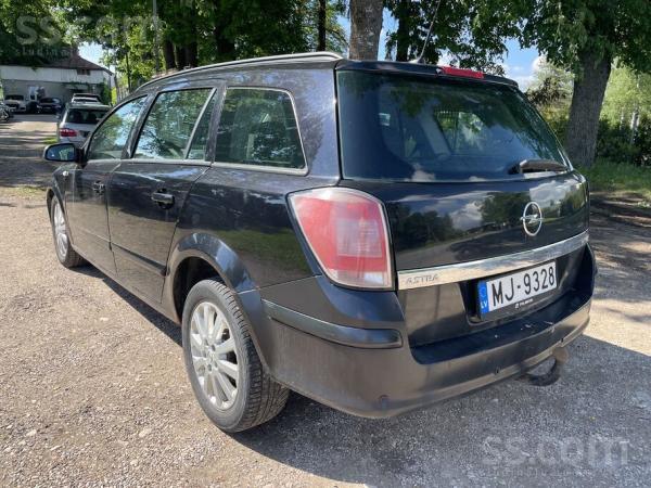 Melns Opel Astra 2008 Rīga, ar dzinēja tilpumu 1.90 L un nobraukumu 430 tūkst. km par 690 €, foto 3 vietnē AUTOMOTO.COM.LV