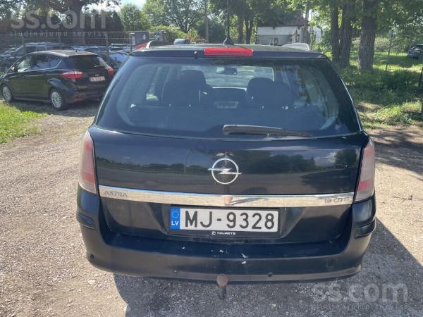 Melns Opel Astra 2008 Rīga, ar dzinēja tilpumu 1.90 L un nobraukumu 430 tūkst. km par 690 €, foto 4 vietnē AUTOMOTO.COM.LV