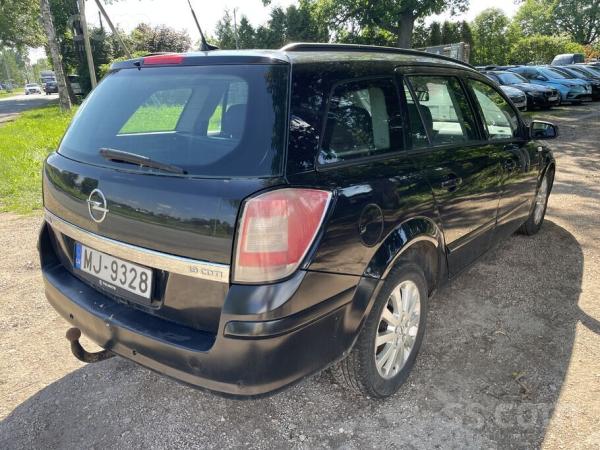 Melns Opel Astra 2008 Rīga, ar dzinēja tilpumu 1.90 L un nobraukumu 430 tūkst. km par 690 €, foto 5 vietnē AUTOMOTO.COM.LV