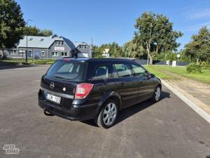 Black Opel Astra 2008 in Birzai, with an engine capacity of 1.90 L and mileage of 357 thousand km for 1399 €, photo 5 on AUTOMOTO.COM.LV