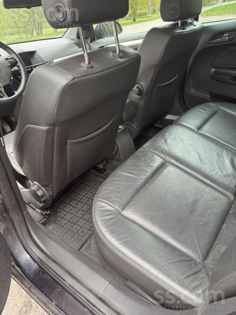 Melns Opel Astra 2009 Jelgava, ar dzinēja tilpumu 1.90 L un nobraukumu 430 tūkst. km par 1800 €, foto 18 vietnē AUTOMOTO.COM.LV