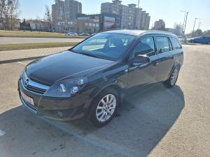 Black Opel Astra 2010 in Kaunas, with an engine capacity of 1.60 L and mileage of 170 thousand km for 2550 €, photo 3 on AUTOMOTO.COM.LV