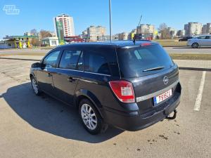 Black Opel Astra 2010 in Kaunas, with an engine capacity of 1.60 L and mileage of 170 thousand km for 2550 €, photo 6 on AUTOMOTO.COM.LV