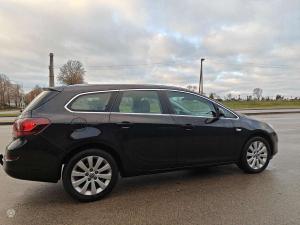 Black Opel Astra 2011 in Taurage, with an engine capacity of 1.96 L and mileage of 236 thousand km for 3100 €, photo 6 on AUTOMOTO.COM.LV