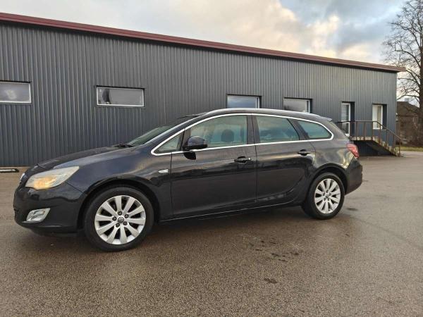 Melns Opel Astra 2011 Tauragė, ar dzinēja tilpumu 1.96 L un nobraukumu 236 tūkst. km par 3100 €, foto 2 vietnē AUTOMOTO.COM.LV