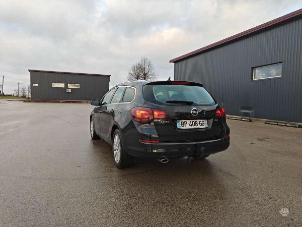 Melns Opel Astra 2011 Tauragė, ar dzinēja tilpumu 1.96 L un nobraukumu 236 tūkst. km par 3100 €, foto 9 vietnē AUTOMOTO.COM.LV