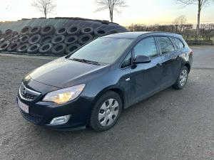 Black Opel Astra 2011 in Kaunas, with an engine capacity of 1.96 L and mileage of 290 thousand km for 2650 €, photo  on AUTOMOTO.COM.LV
