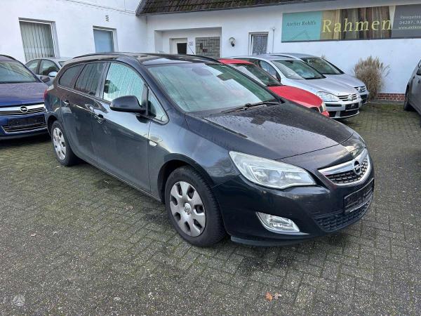 Black Opel Astra 2011 in Kaunas, with an engine capacity of 1.96 L and mileage of 290 thousand km for 2650 €, photo 7 on AUTOMOTO.COM.LV