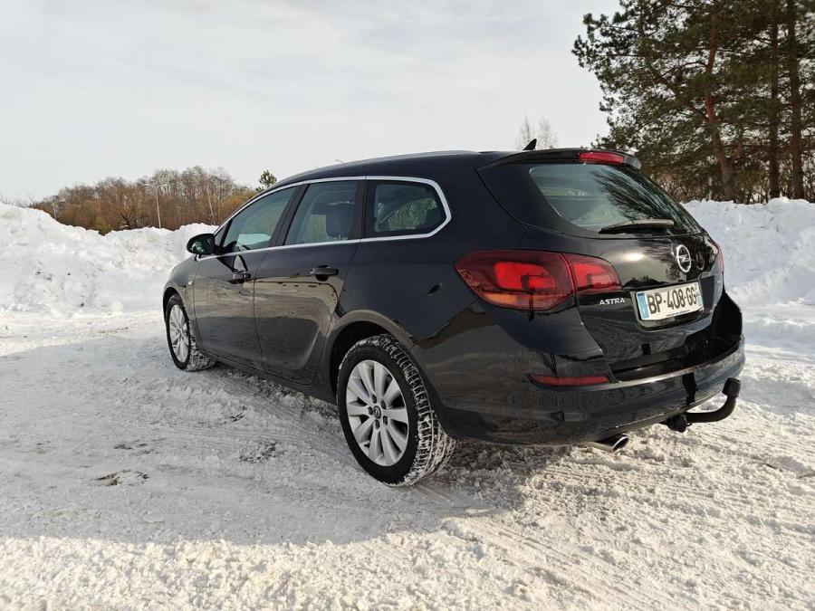 Melns Opel Astra 2011 Tauragė, ar dzinēja tilpumu 1.96 L un nobraukumu 236 tūkst. km par 2950 €, foto 11 vietnē AUTOMOTO.COM.LV