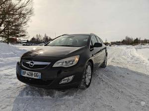 Melns Opel Astra 2011 Tauragė, ar dzinēja tilpumu 1.96 L un nobraukumu 236 tūkst. km par 2950 €, foto 13 vietnē AUTOMOTO.COM.LV