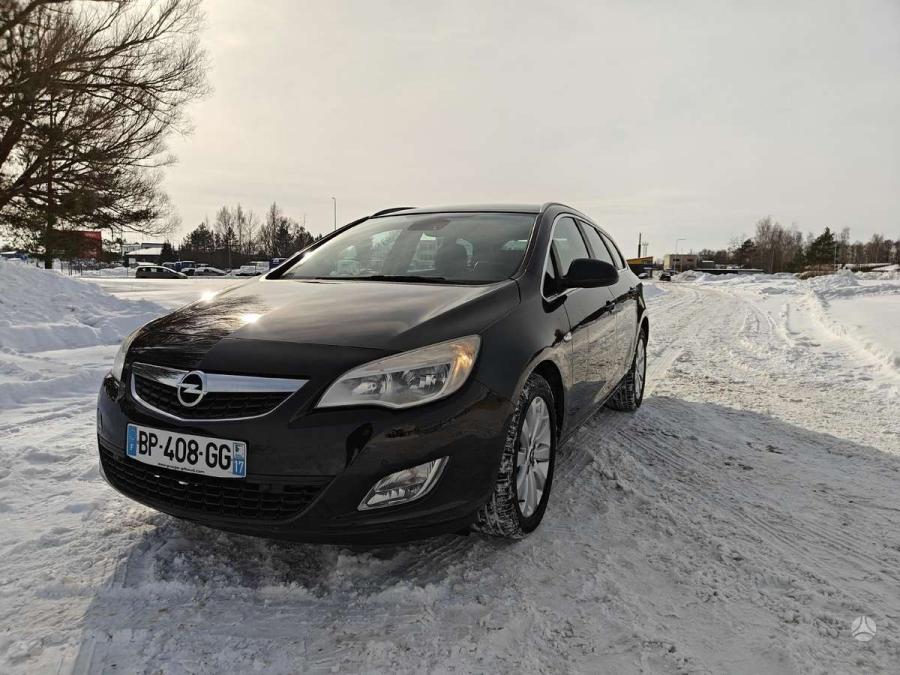 Melns Opel Astra 2011 Tauragė, ar dzinēja tilpumu 1.96 L un nobraukumu 236 tūkst. km par 2950 €, foto 13 vietnē AUTOMOTO.COM.LV
