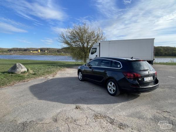 Black Opel Astra 2011 in Kaunas, with an engine capacity of 1.40 L and mileage of 250 thousand km for 2500 €, photo 3 on AUTOMOTO.COM.LV