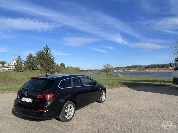 Black Opel Astra 2011 in Kaunas, with an engine capacity of 1.40 L and mileage of 250 thousand km for 2500 €, photo 8 on AUTOMOTO.COM.LV
