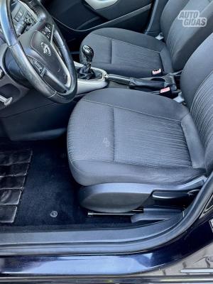 Black Opel Astra 2011 in Kaunas, with an engine capacity of 1.70 L and mileage of 214 thousand km for 3100 €, photo 12 on AUTOMOTO.COM.LV
