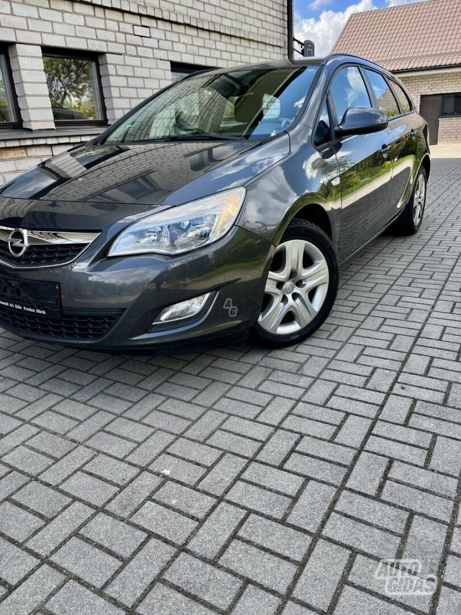 Black Opel Astra 2011 in Kaunas, with an engine capacity of 1.70 L and mileage of 214 thousand km for 3100 €, photo 19 on AUTOMOTO.COM.LV