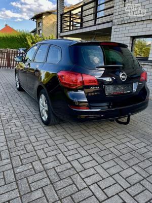 Black Opel Astra 2011 in Kaunas, with an engine capacity of 1.70 L and mileage of 214 thousand km for 3100 €, photo 7 on AUTOMOTO.COM.LV