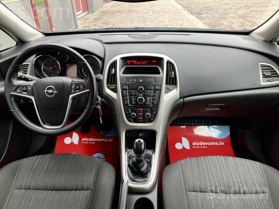 Black Opel Astra 2011 in Talsi, with an engine capacity of 1.70 L and mileage of 297 thousand km for 3999 €, photo 17 on AUTOMOTO.COM.LV