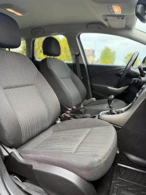 Black Opel Astra 2011 in Riga, with an engine capacity of 1.40 L and mileage of 270 thousand km for 3600 €, photo 13 on AUTOMOTO.COM.LV