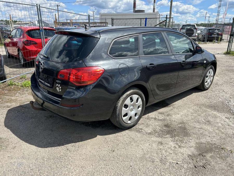 Black Opel Astra 2011 in Kaunas, with an engine capacity of 1.96 L and mileage of 276 thousand km for 2650 €, photo 3 on AUTOMOTO.COM.LV