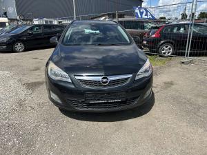 Black Opel Astra 2011 in Kaunas, with an engine capacity of 1.96 L and mileage of 276 thousand km for 2650 €, photo 6 on AUTOMOTO.COM.LV